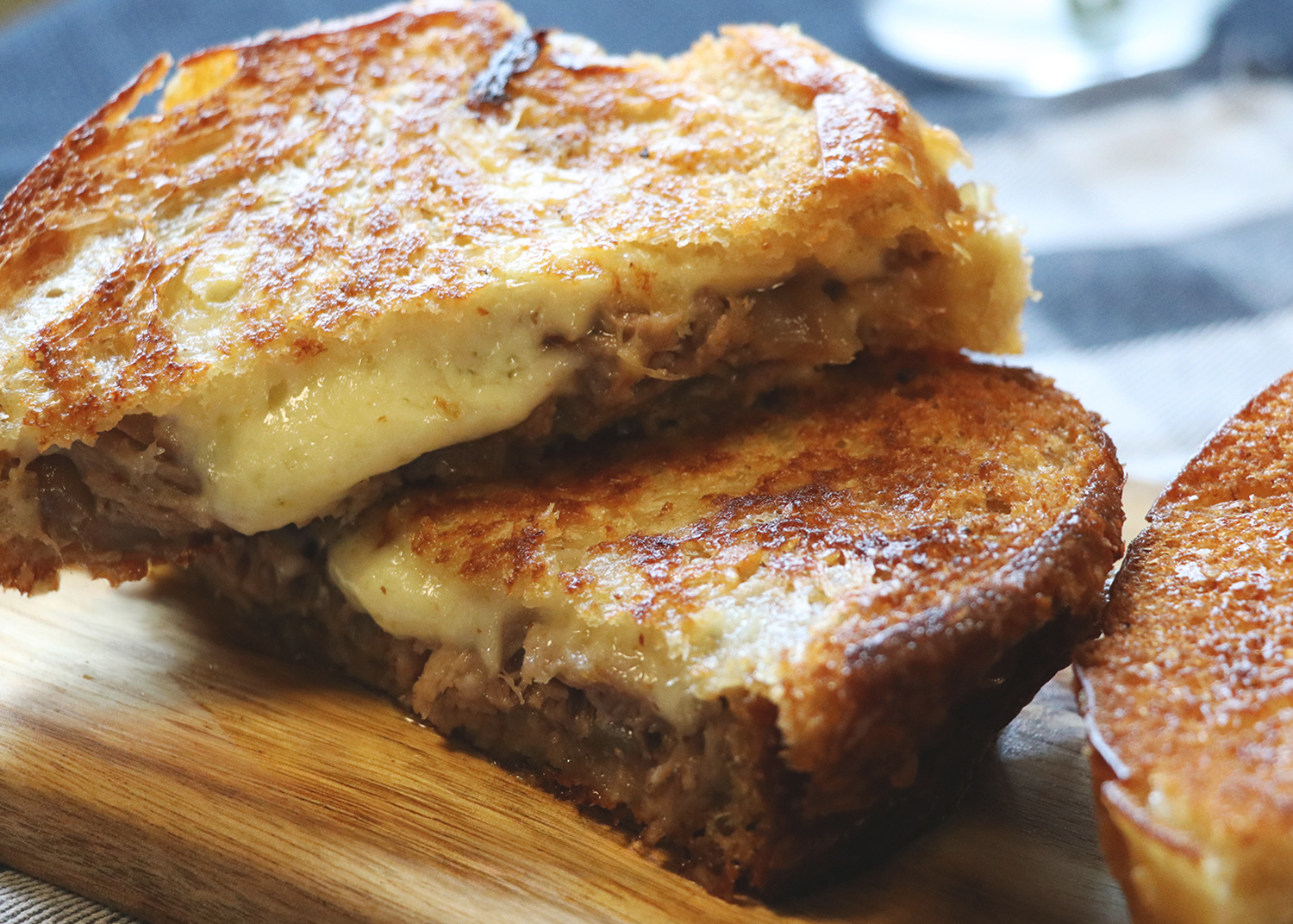 Grilled-cheese with duck confit, caramelized onions, maple syrup and ...
